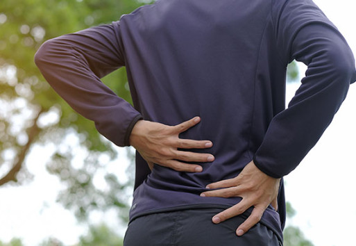 Why Standing All Day Causes Back Pain | Chiropractor in Olathe